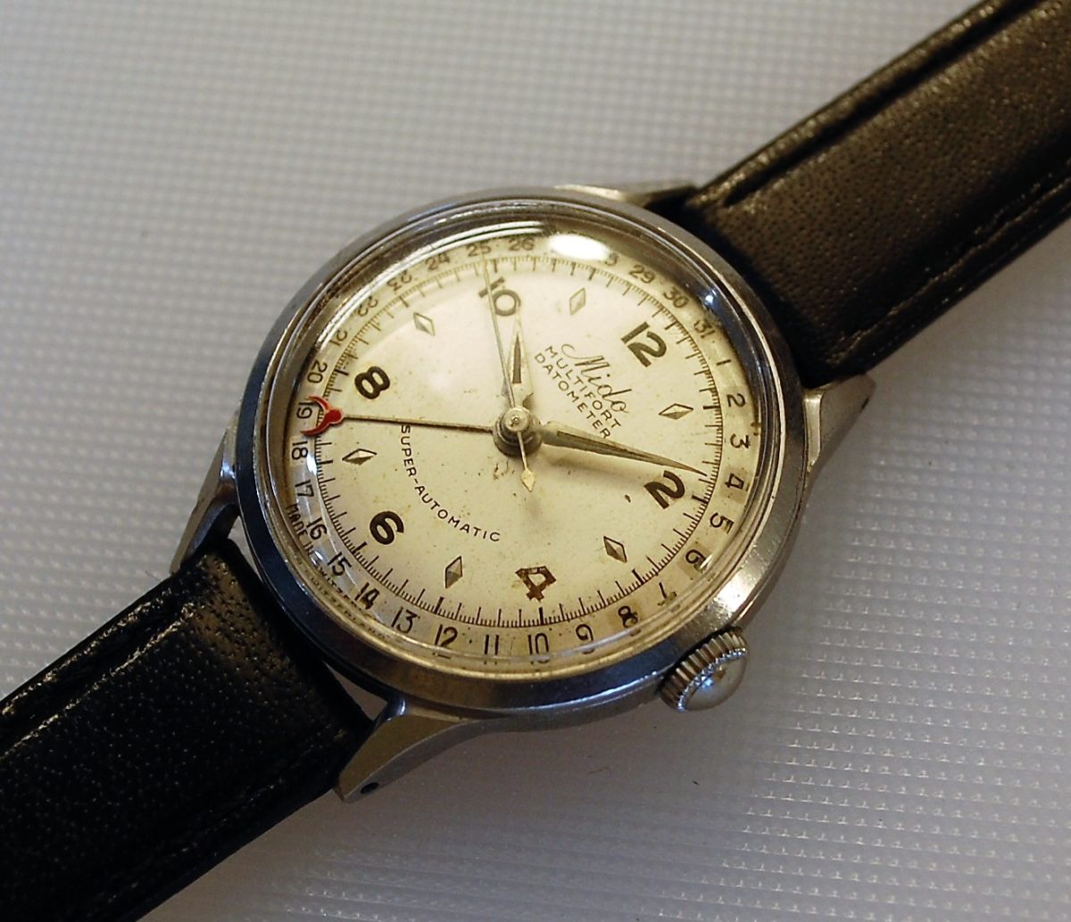 SOLD 1953 Mido Multifort Datometer bumper automatic - Birth Year Watches