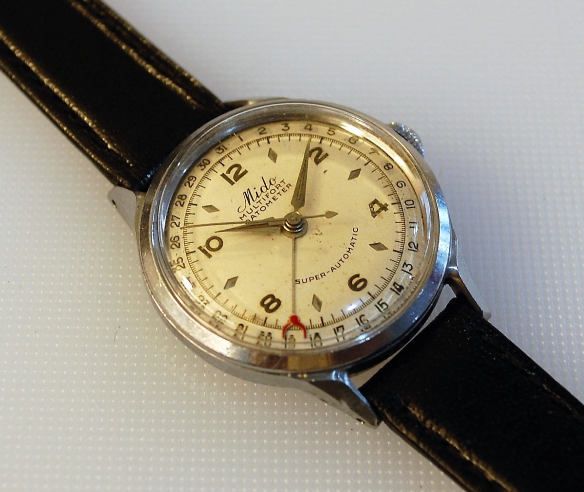 SOLD 1953 Mido Multifort Datometer bumper automatic - Birth Year Watches